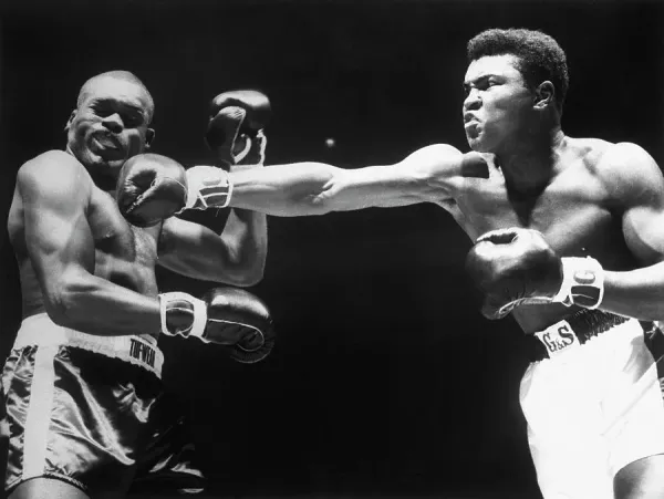 Boxer Cassius Clay Punching Doug Jones Our beautiful Wall Art and Photo ...