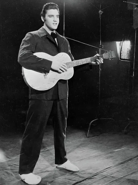 Elvis Presley Playing Guitar