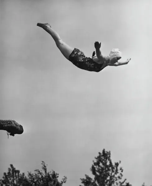 Vintage Diving Into Water